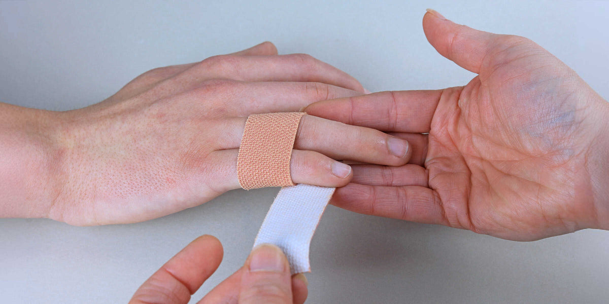 Guide on How to Tape a Sprained Finger — Vive Health